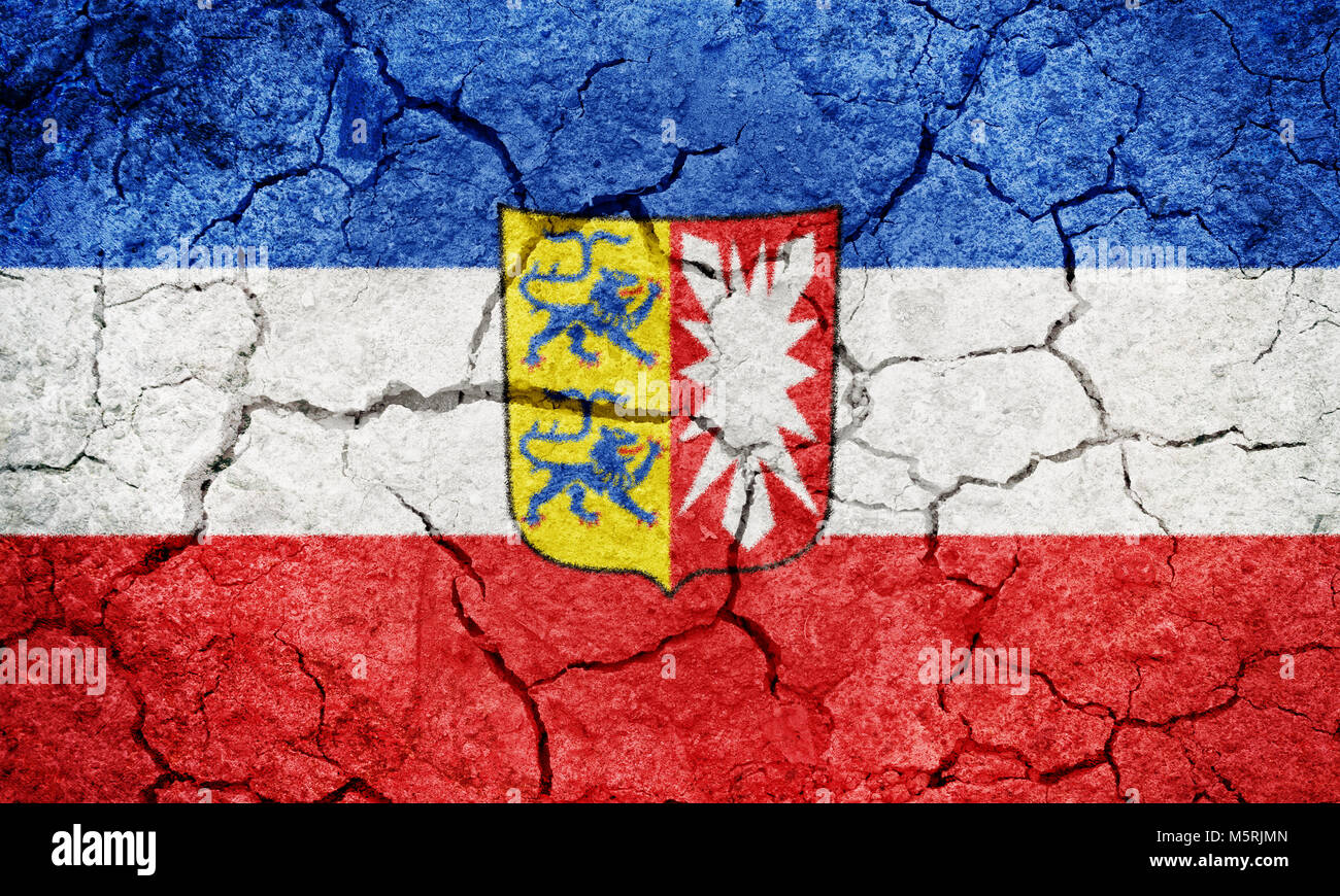 Schleswig-Holstein, state of Germany, flag on dry earth ground texture ...