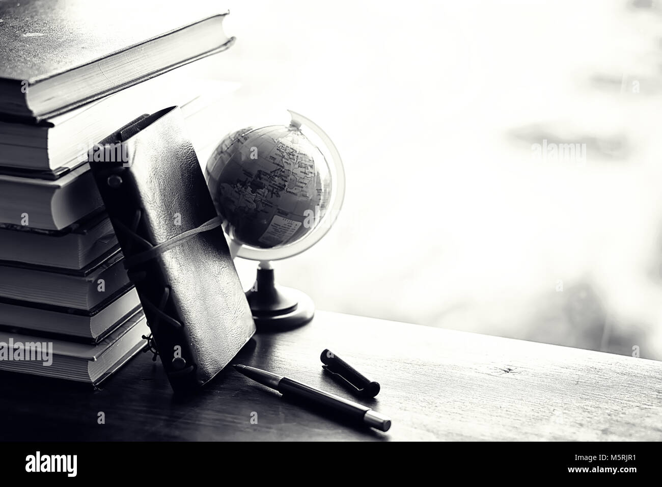 A stack of textbooks on a table Stock Photo - Alamy