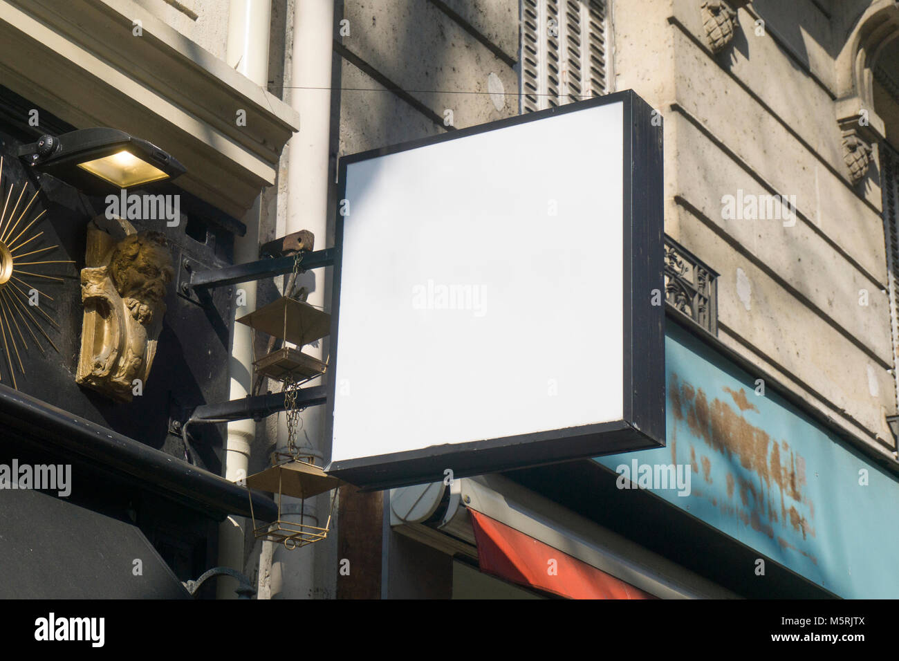 Blank white shop sign ready for your design Stock Photo - Alamy