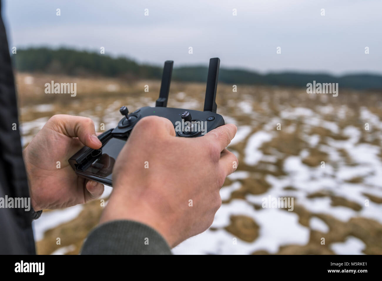 Person using a drone remote control hi-res stock photography and images ...