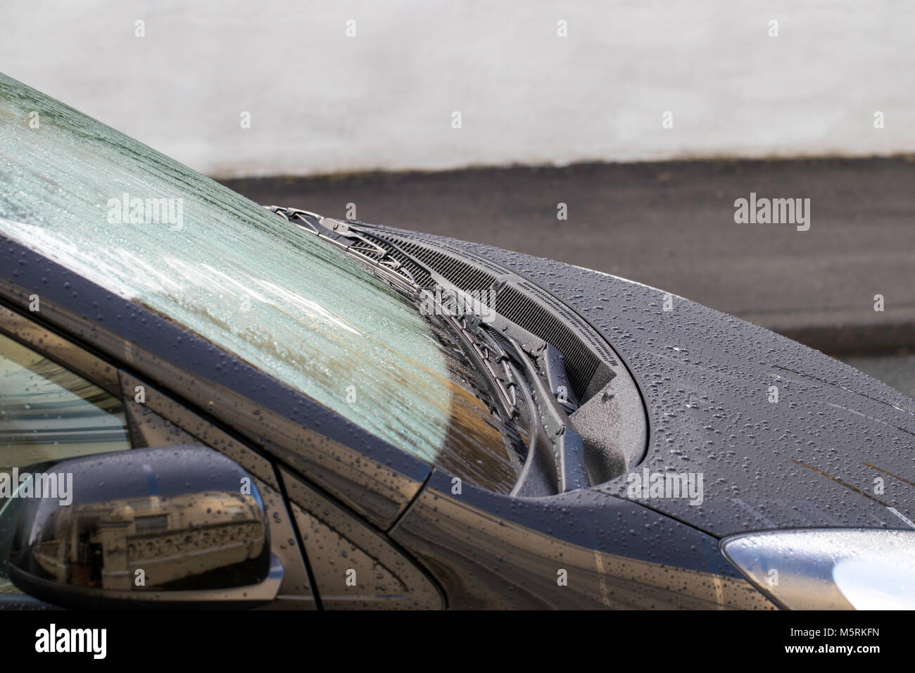 England. Front of car, top of bonnet, window screen wipers and ...