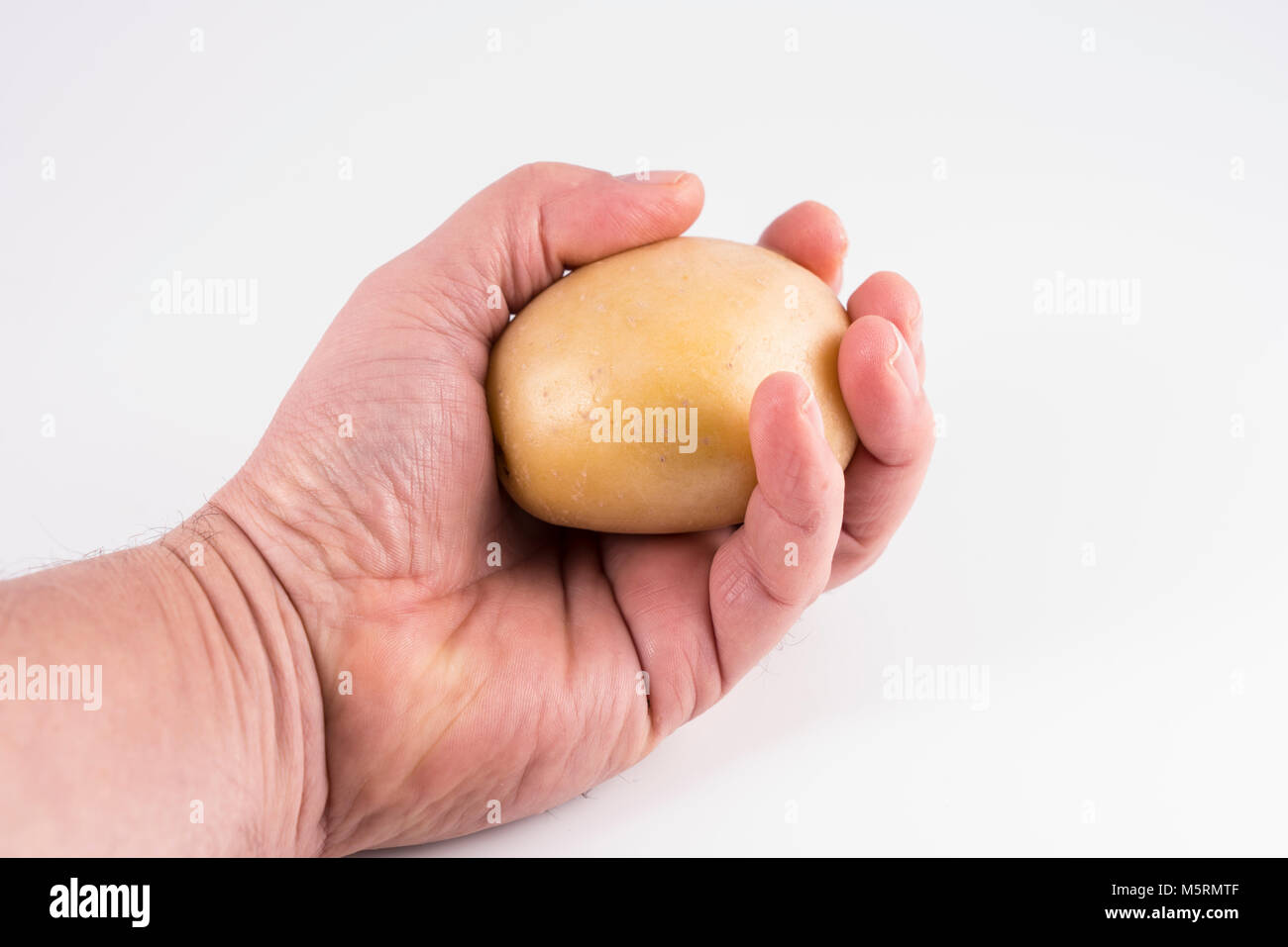 Hand Half Potato High Resolution Stock Photography and Images - Alamy