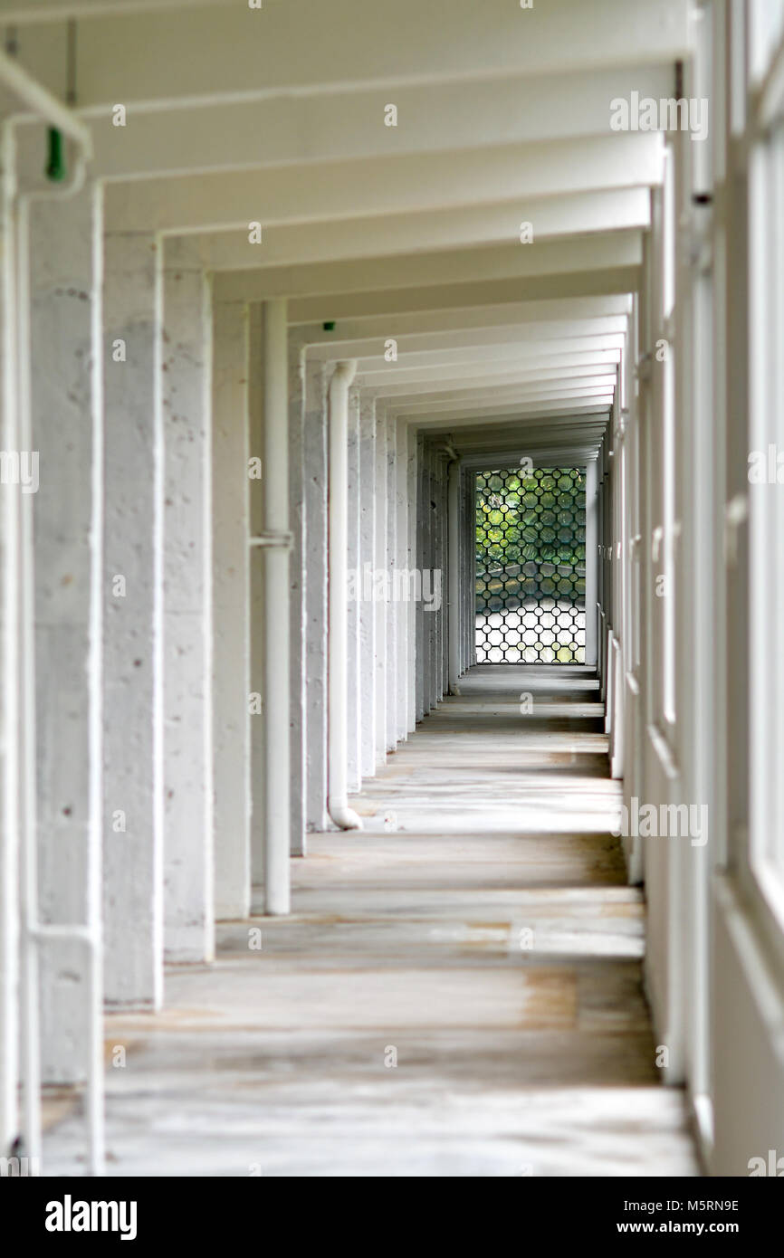 White interior building with windows and pillars Stock Photo - Alamy