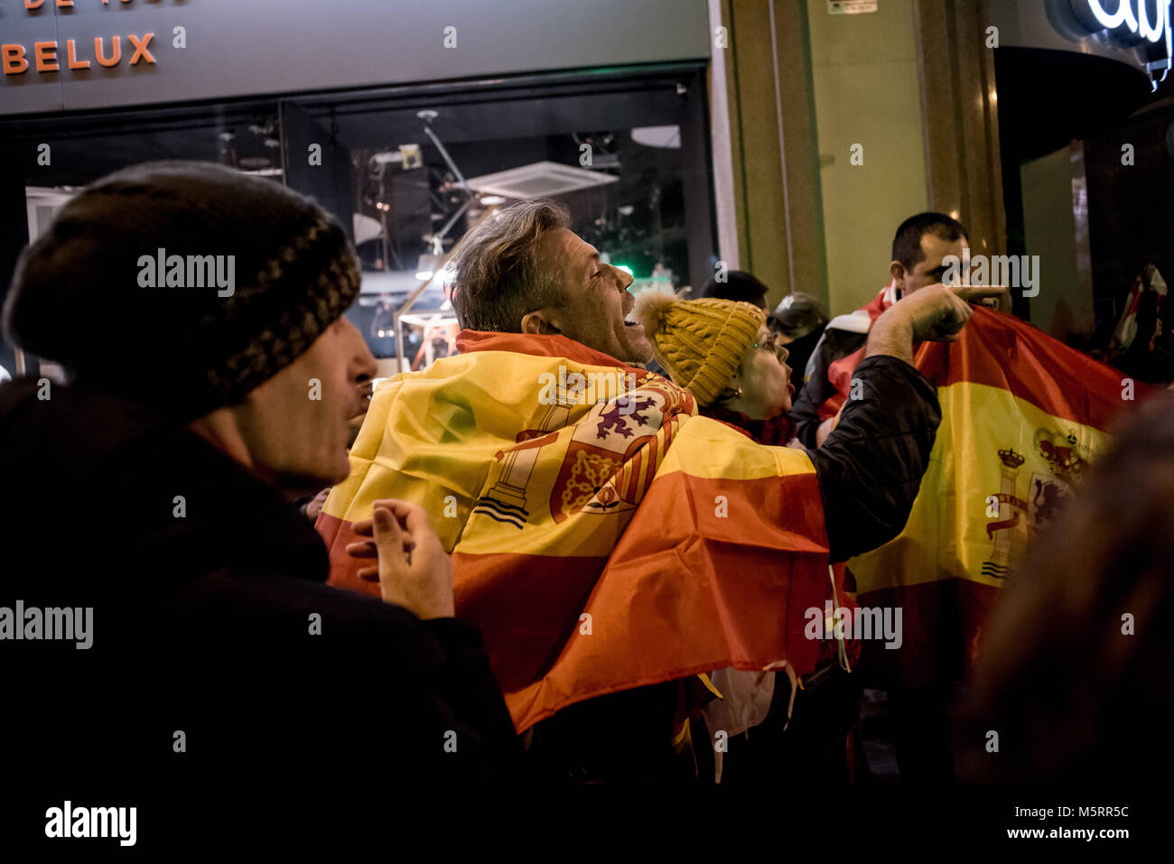 Barcelona, Spain. 25th Feb, 2018. A man wrapped with a Spanish flag ...
