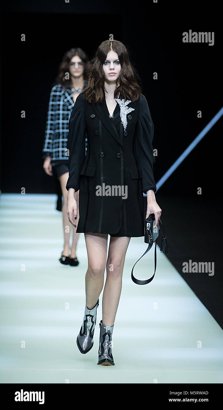 Milan, Italy. 25th Feb, 2018. Models present creations of Emporio ...