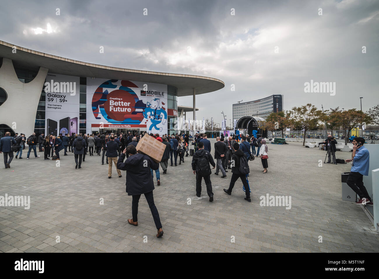 Visitors enter the Fira Gran Via venue as the annual Mobile World ...