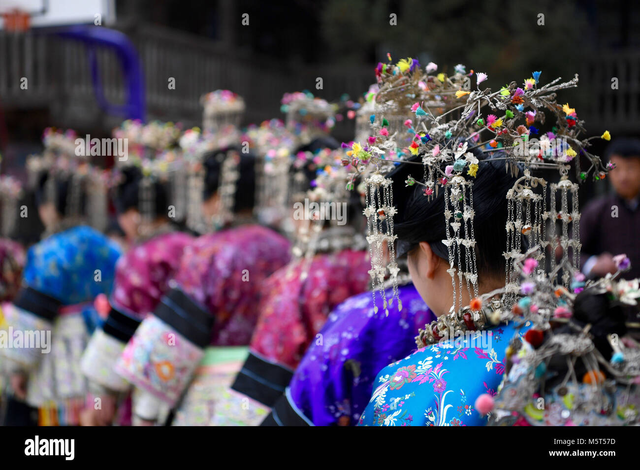 Rongjiang, China's Guizhou Province. 26th Feb, 2018. People wearing ...