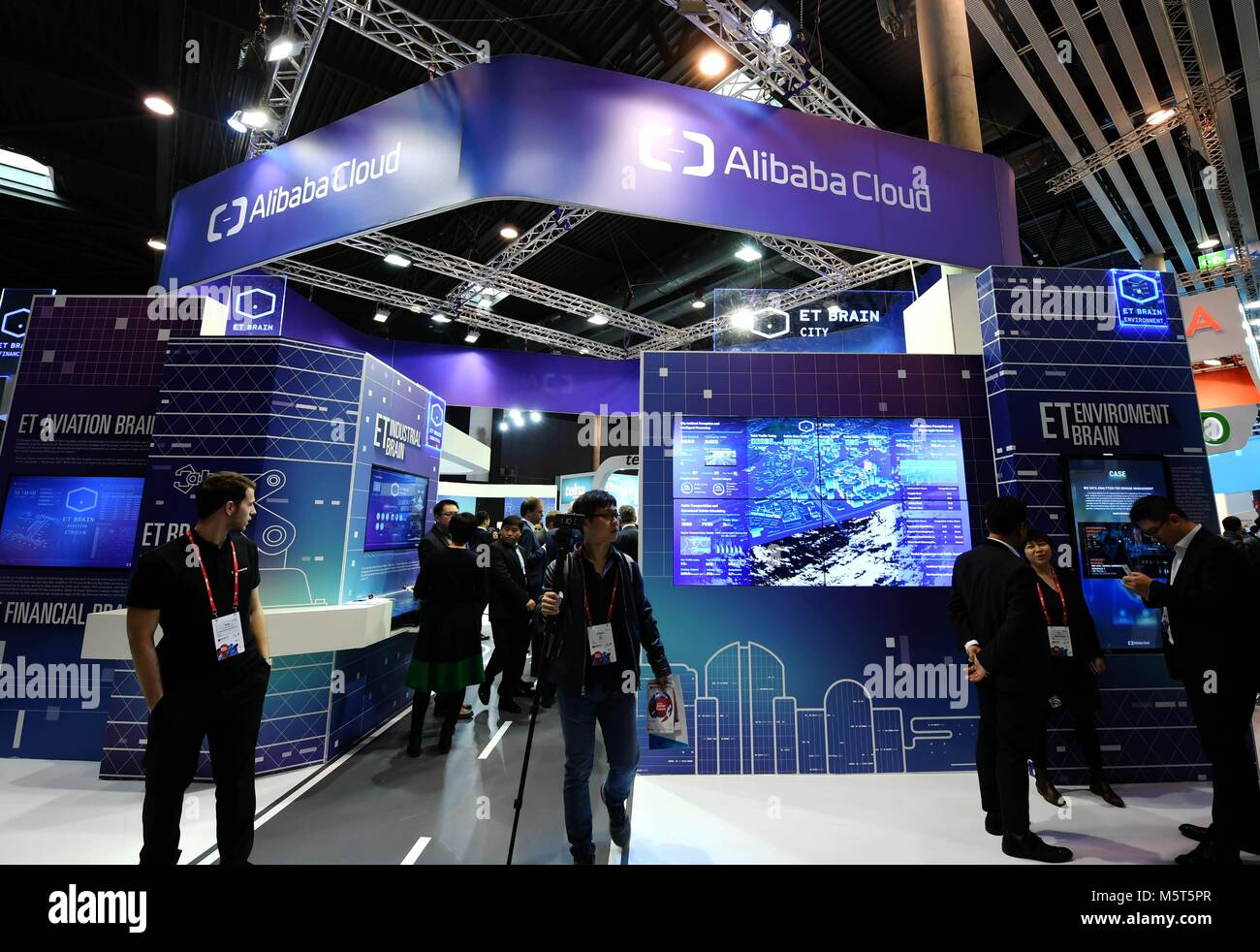 Barcelona, Spain. 26th Feb, 2018. People visit Alibaba Cloud's booth during the first day of the ...