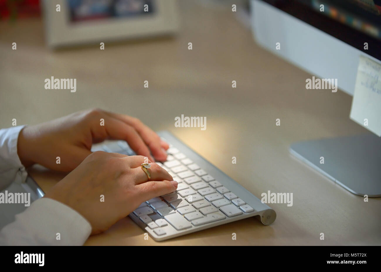 Close-up of woman hands using computer keyboard in office Stock Photo ...