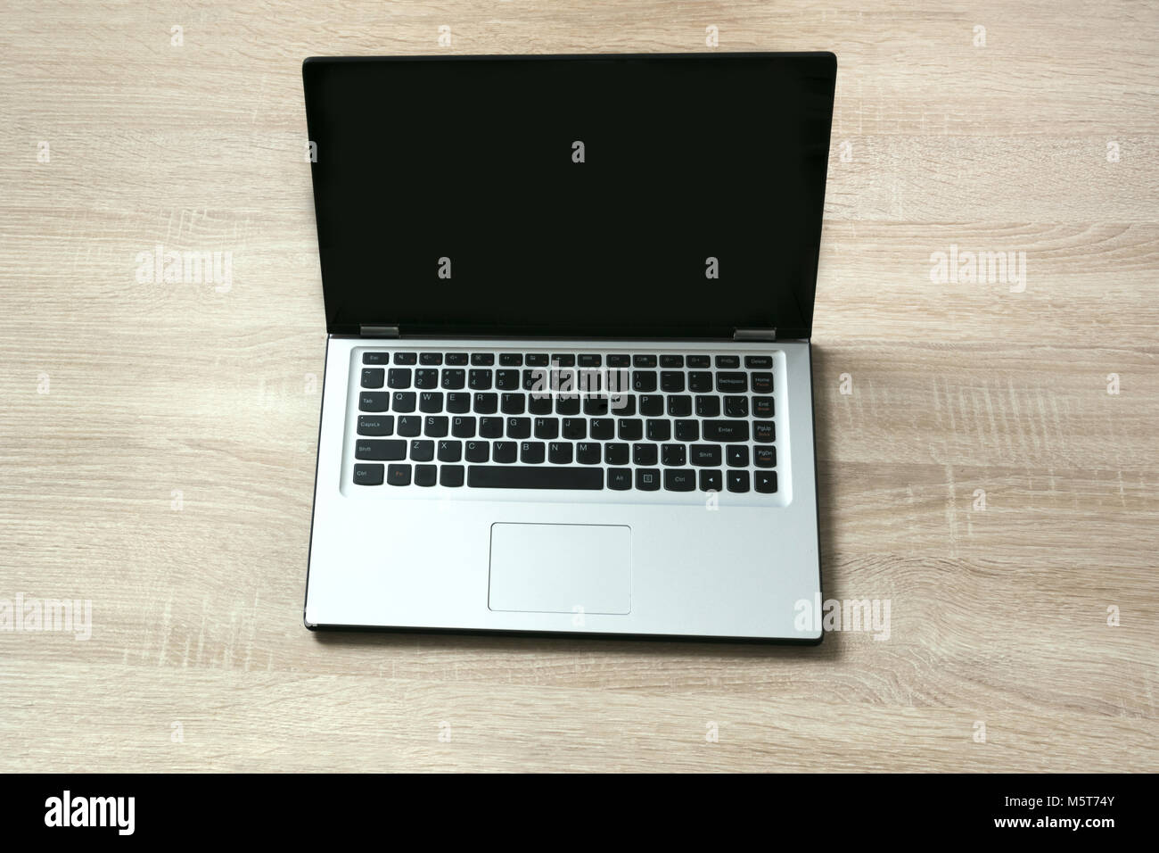 Open laptop on office wooden desk table. Top view with copy space Stock ...
