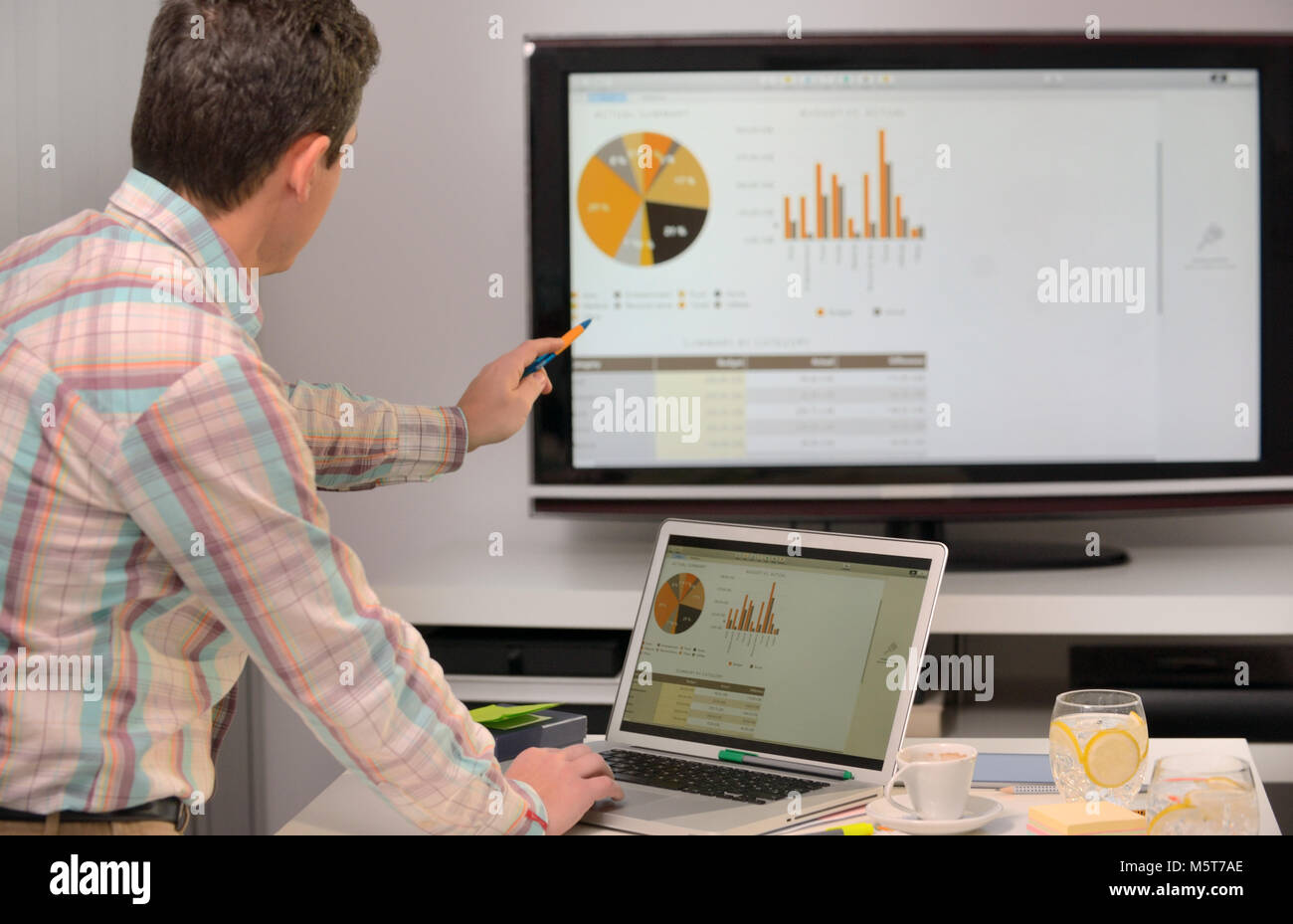 Desk paperwork graphs hi-res stock photography and images - Alamy