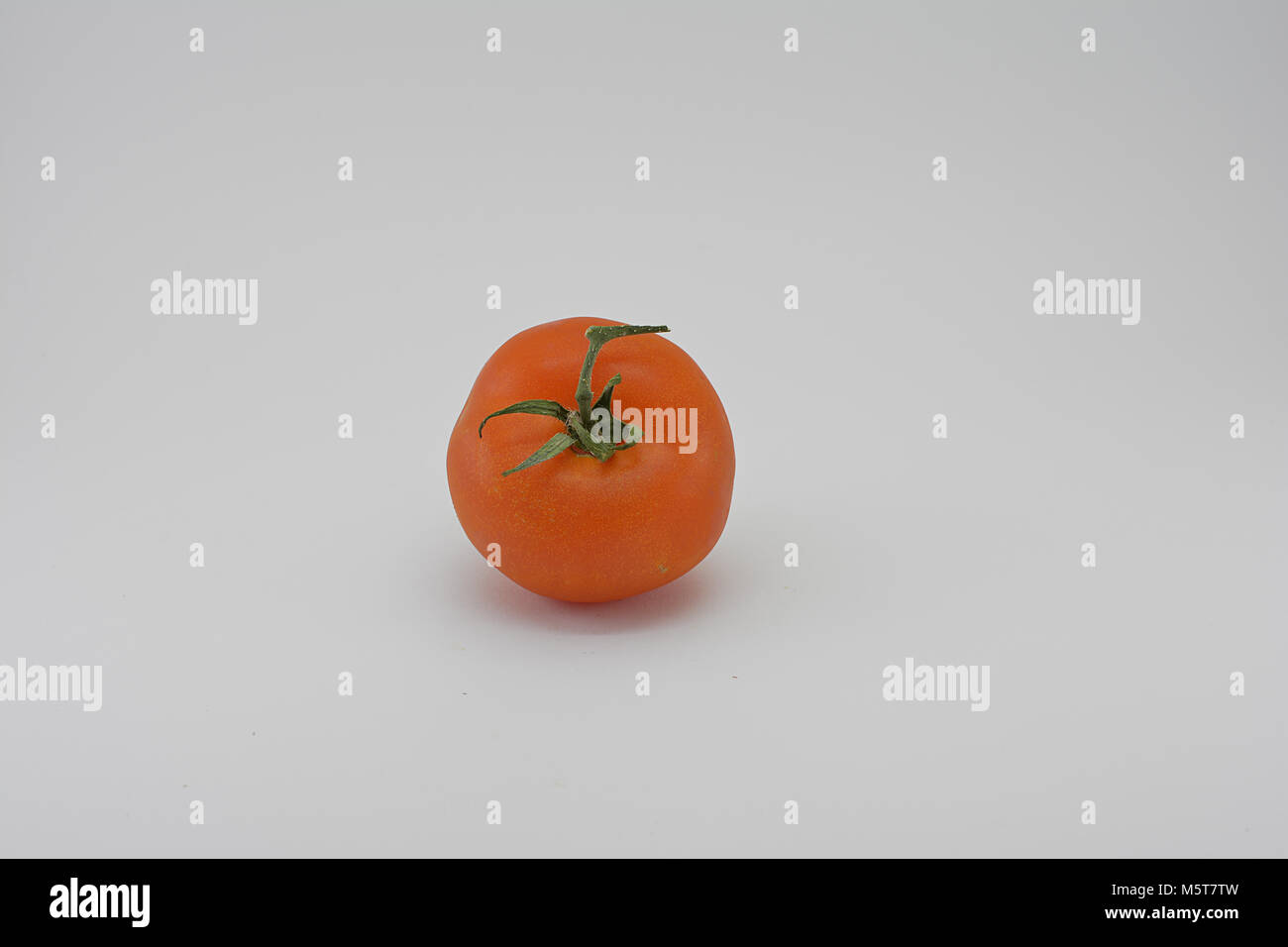 Real Tomato isolated on white background studio Stock Photo - Alamy