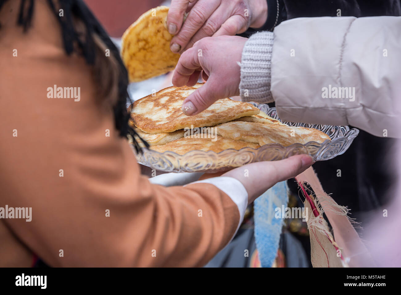 Russian food pancakes, social problems of eating, feeding homeless ...