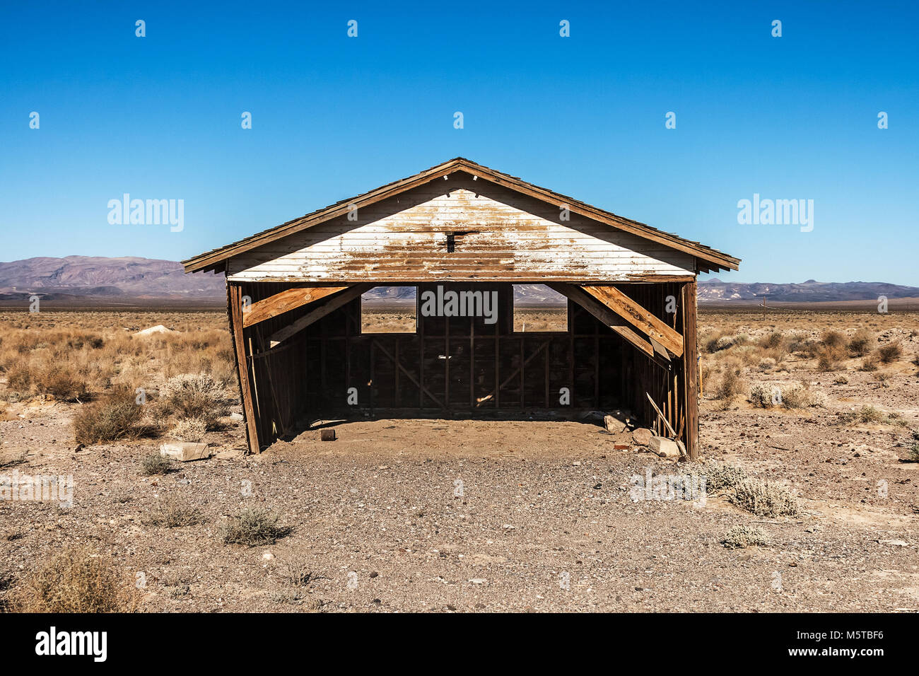 Ruins of a wooden barn in the desert, Death Valley Junction, California ...