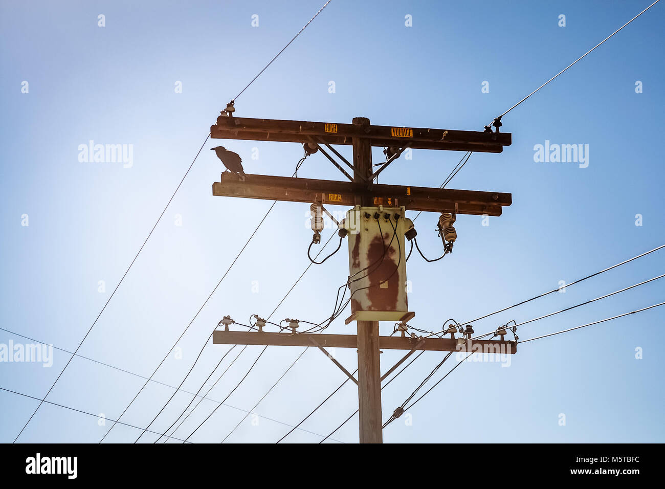 Old wooden electricity pylon power hi-res stock photography and images ...