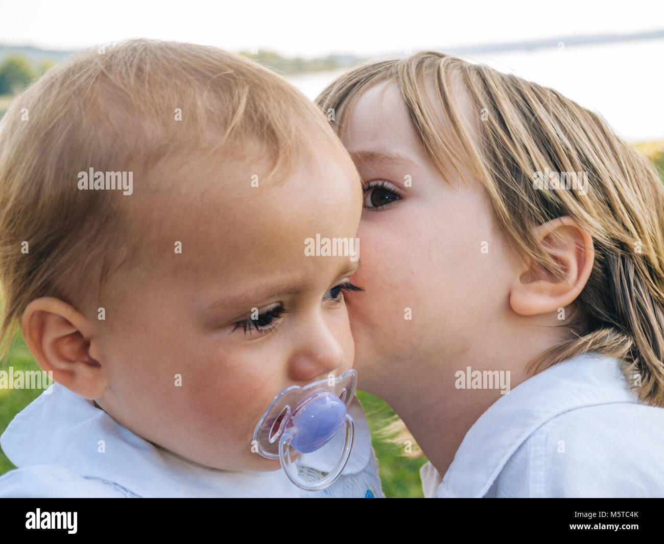 Two Kissing Brothers Portrait High Resolution Stock Photography and Images - Alamy