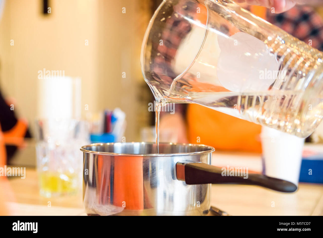 Pouring broth into pot hi-res stock photography and images - Alamy