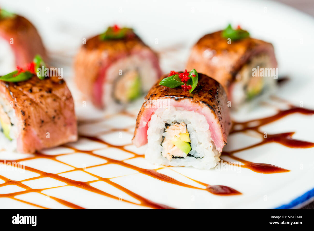 Traditional japanese sushi rolls in restaurant Stock Photo - Alamy