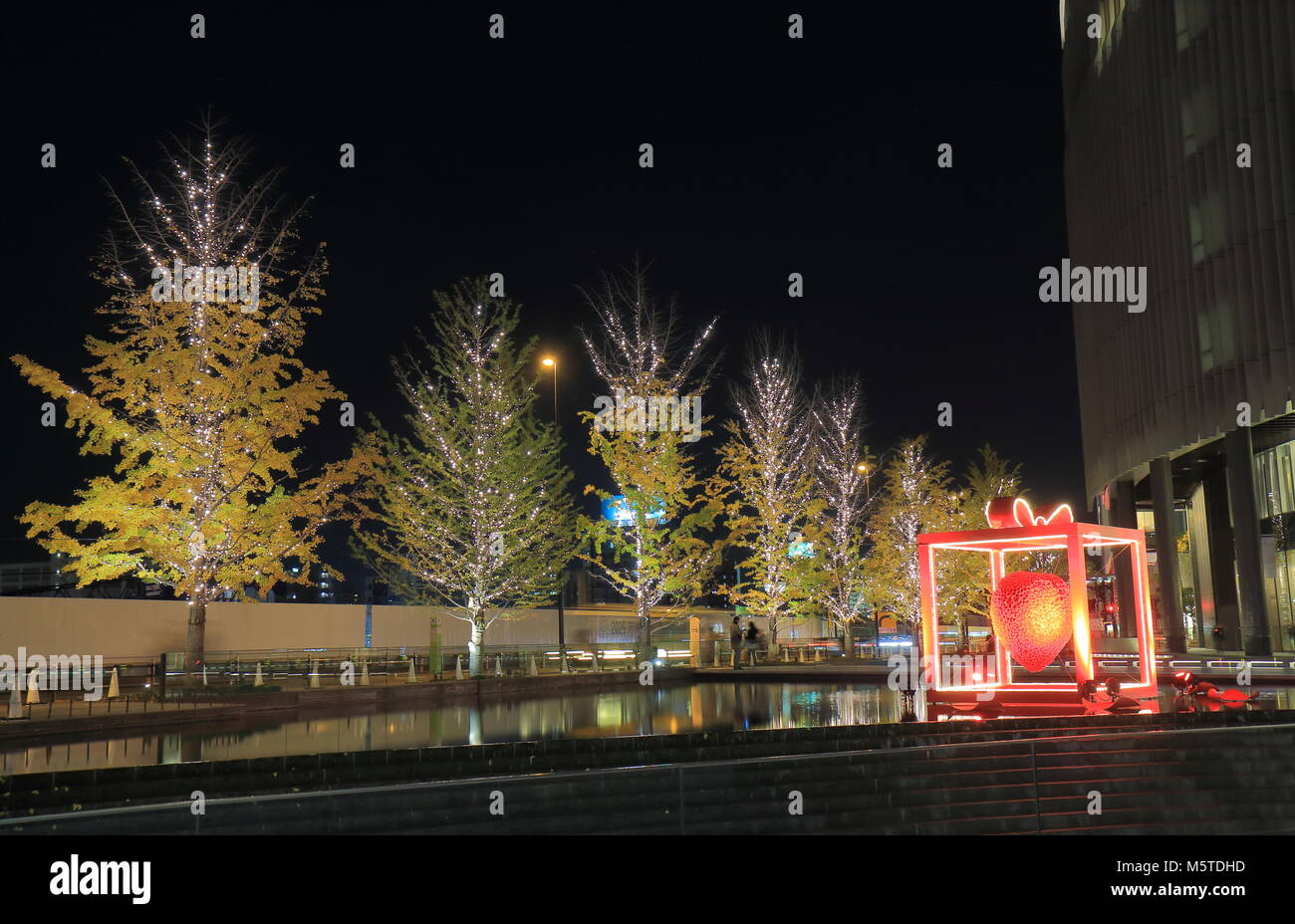 People visit Christmas illumination at Osaka train station in Osaka ...