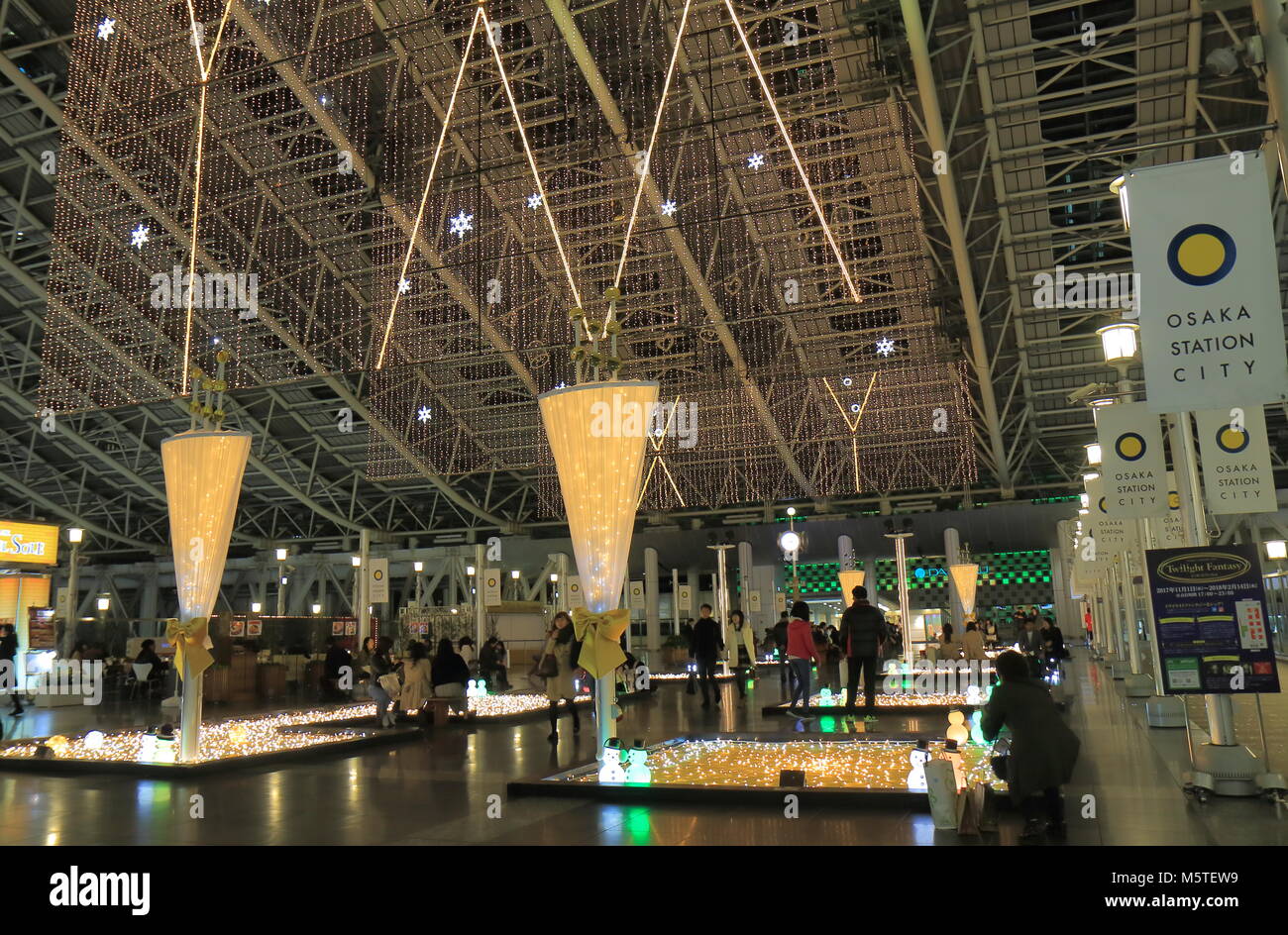 People visit Christmas illumination at Osaka JR train station in Osaka ...