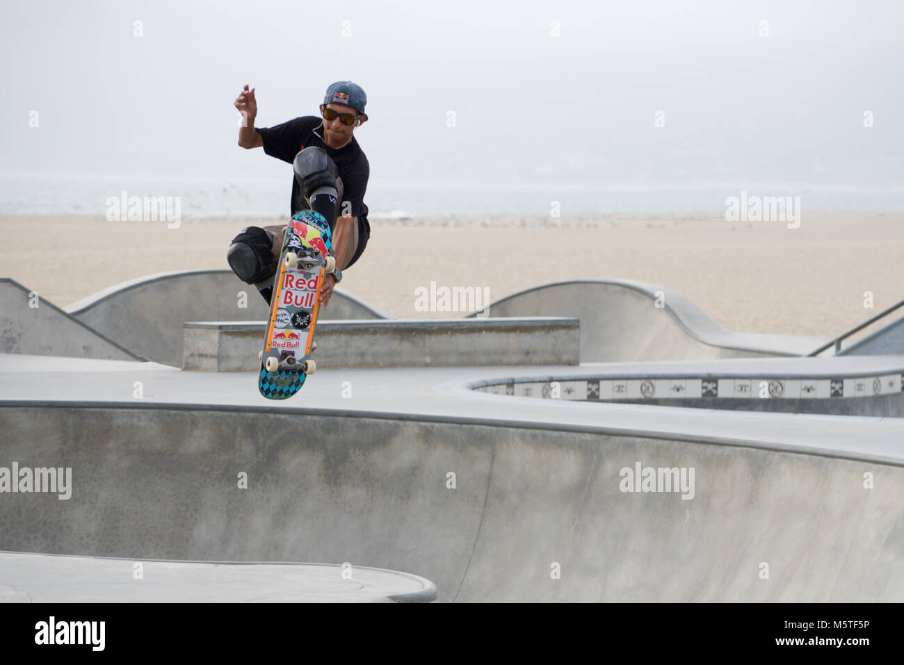 A skateboarder performing tricks in the pool at Venice Beach Skatepark ...