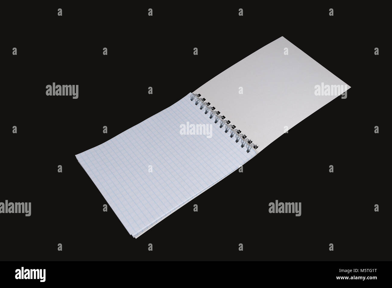 Notepad sheet. Isolated on a black background Stock Photo - Alamy