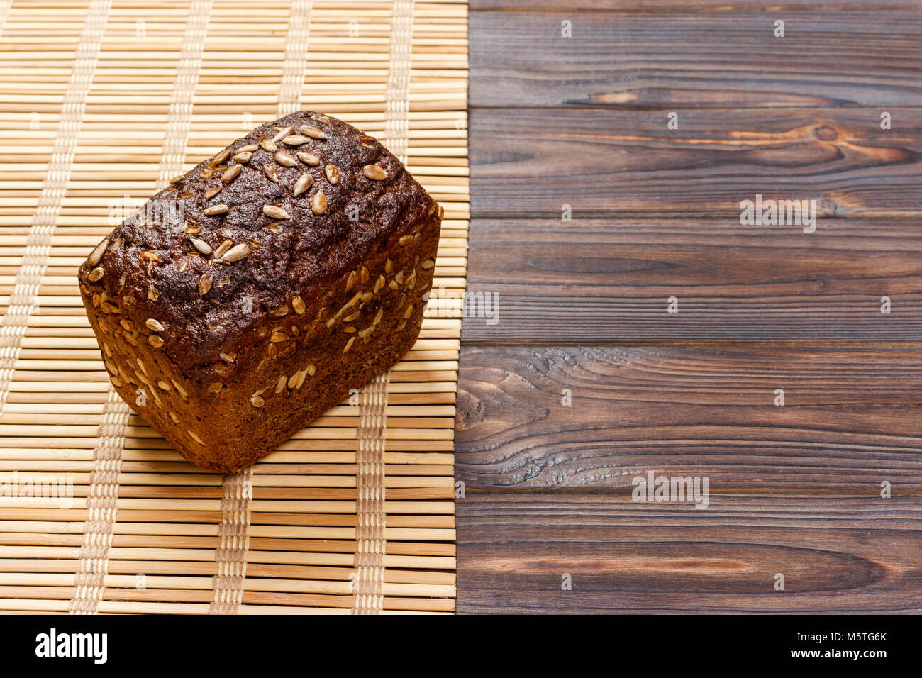Traditional rye bread with seeds, baked in brick oven. Healthy and full ...