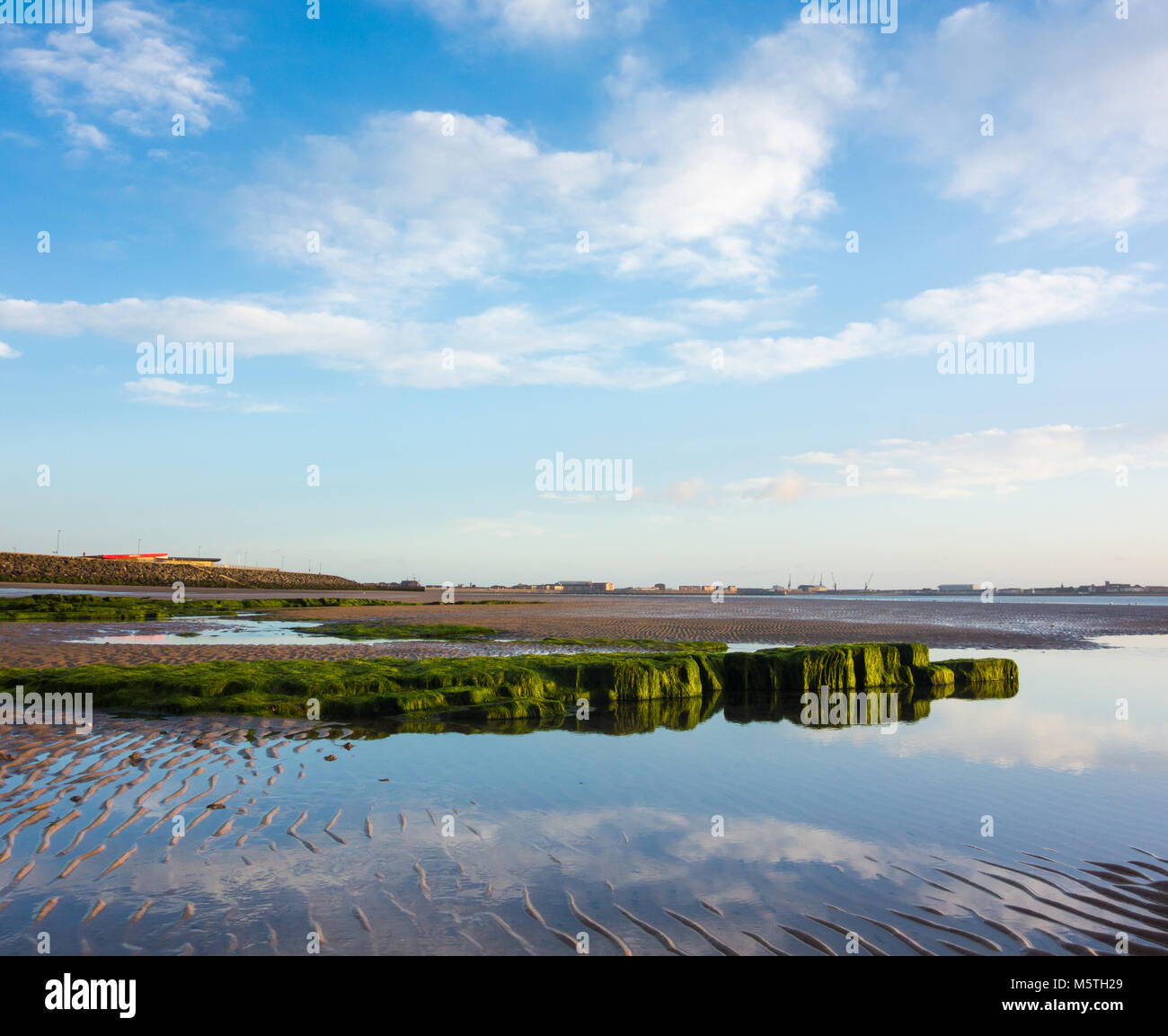 View from England coast path on Seaton Carew beach towards Hartlepool ...