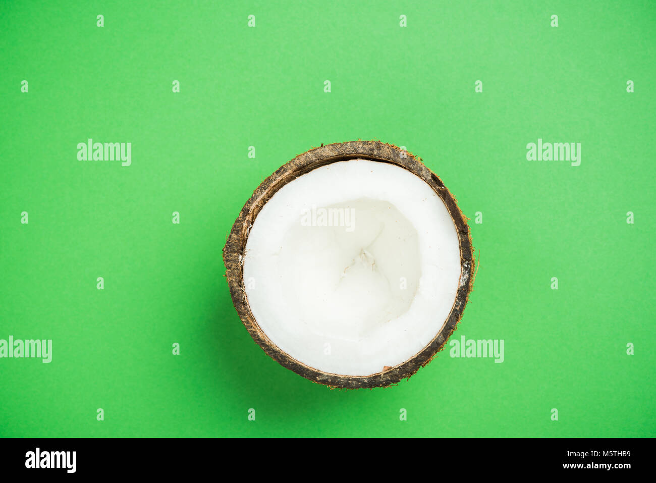 Coconut on green pastel background.Creative minimal layout Stock Photo ...