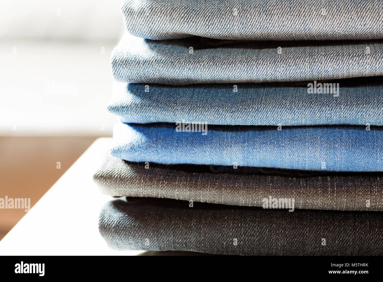 Stack of jeans hi-res stock photography and images - Alamy