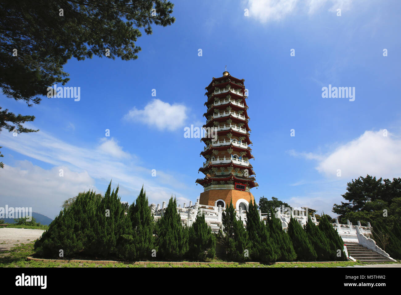 Colorful tower against the blue sky in the park Stock Photo - Alamy