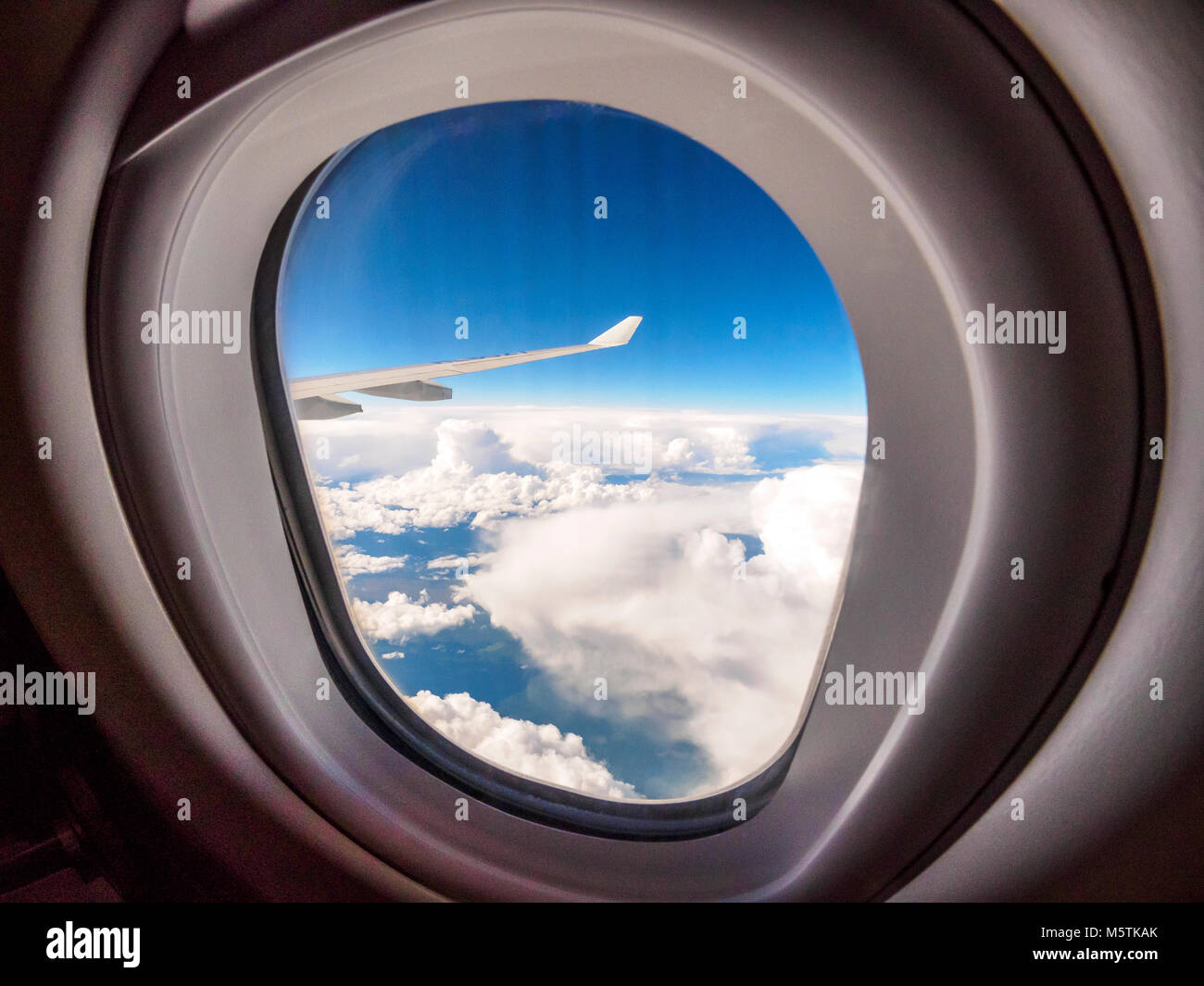 View through the porthole of aircraft Stock Photo - Alamy