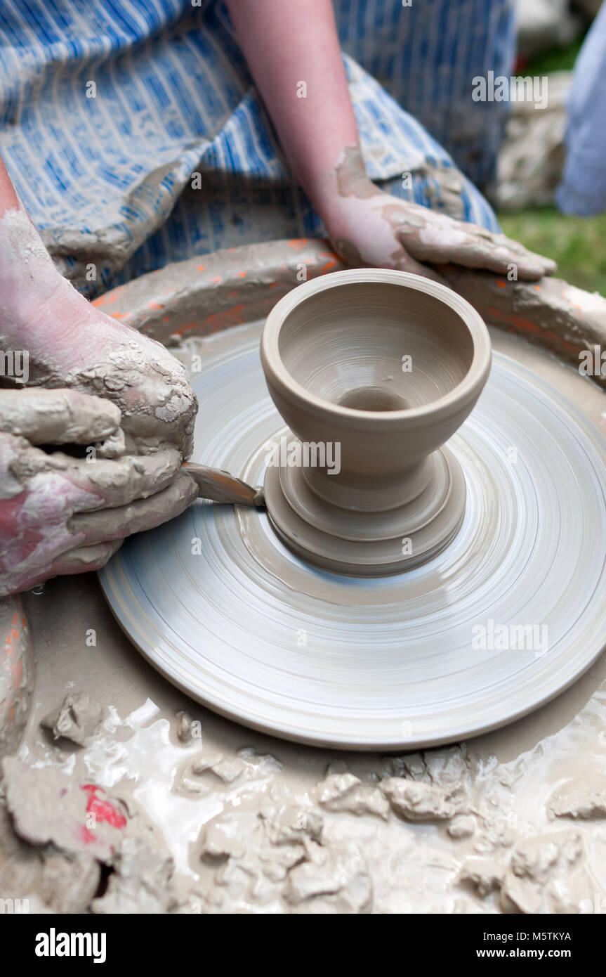 Pottery - formation process of the clay dish with traditional method as ...