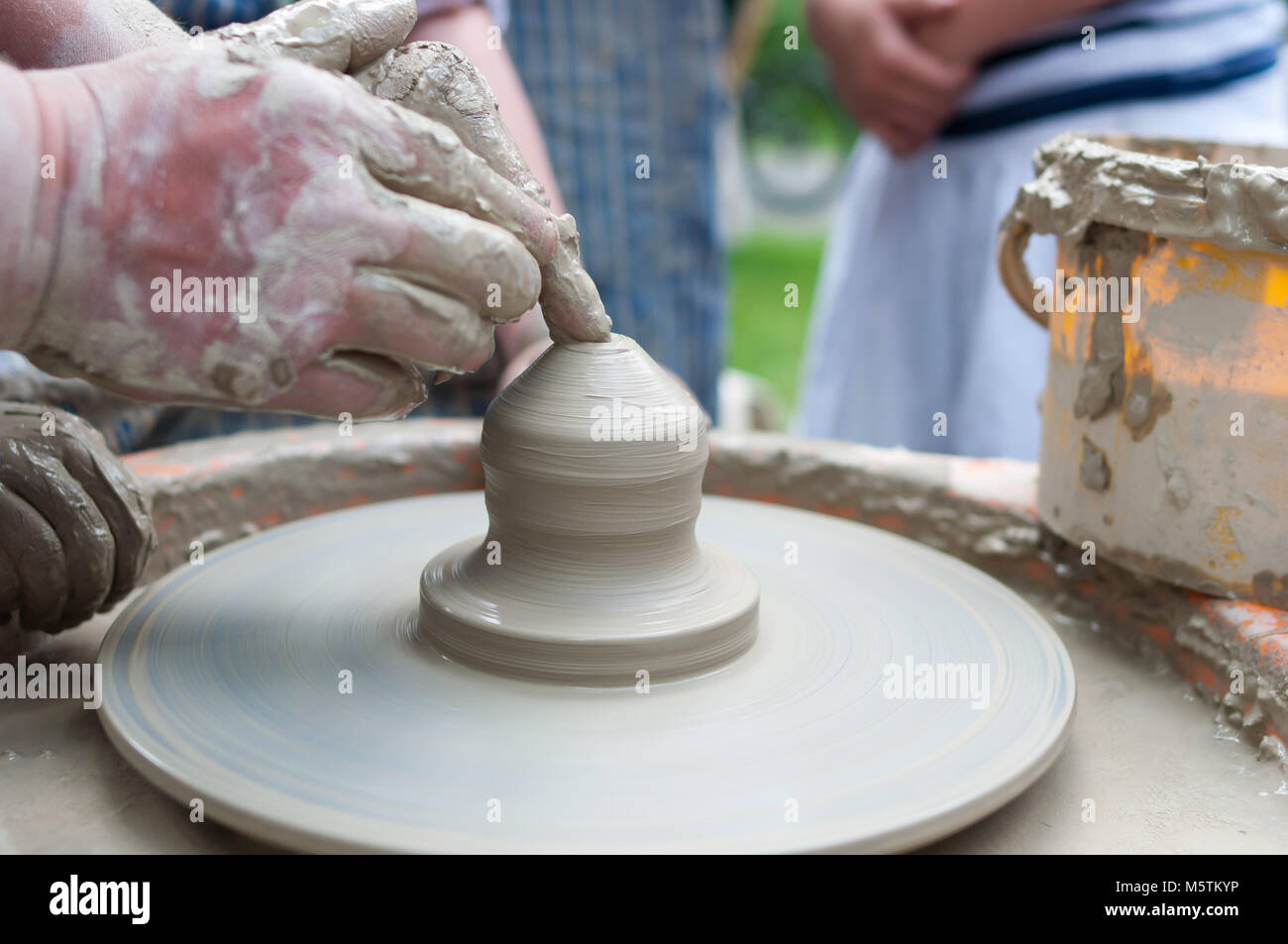 Pottery - formation process of the clay dish with traditional method as ...