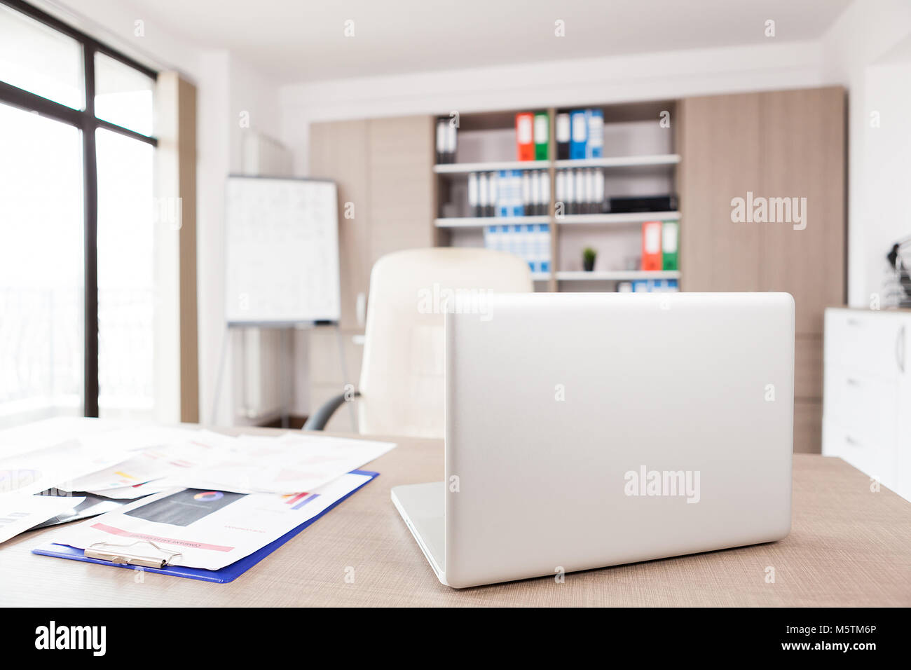 Modern office interior with a table Stock Photo - Alamy