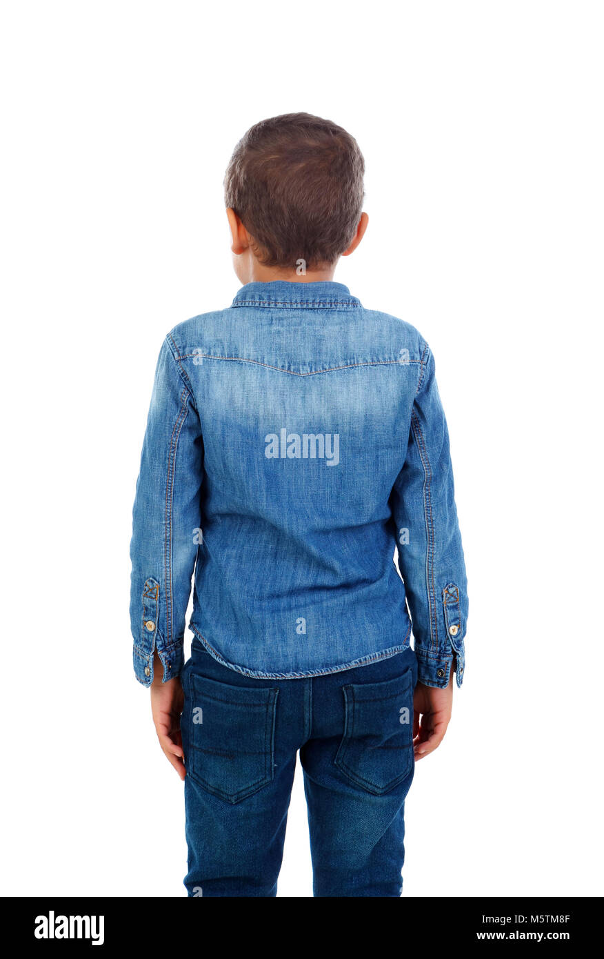 Back view of a small child with denim shirt isolated on a white ...