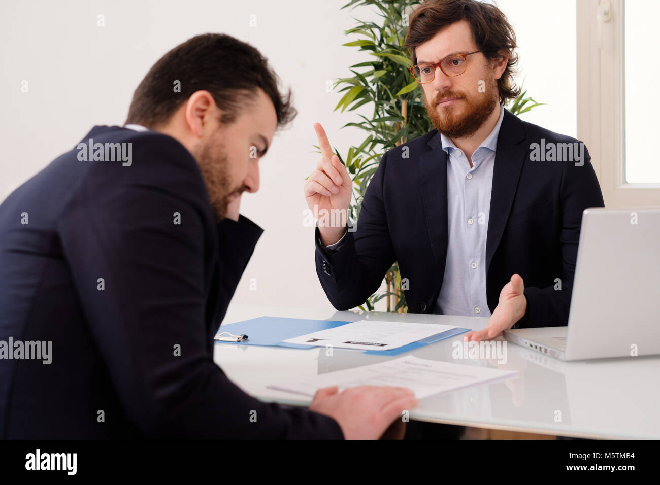 Nervous young employee hi-res stock photography and images - Alamy