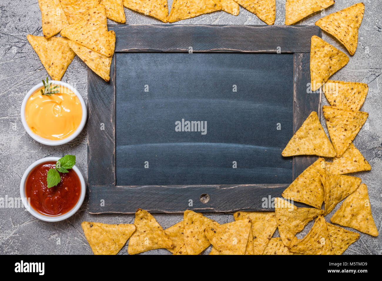 Mexican nacho with sauces and chalk board Stock Photo - Alamy