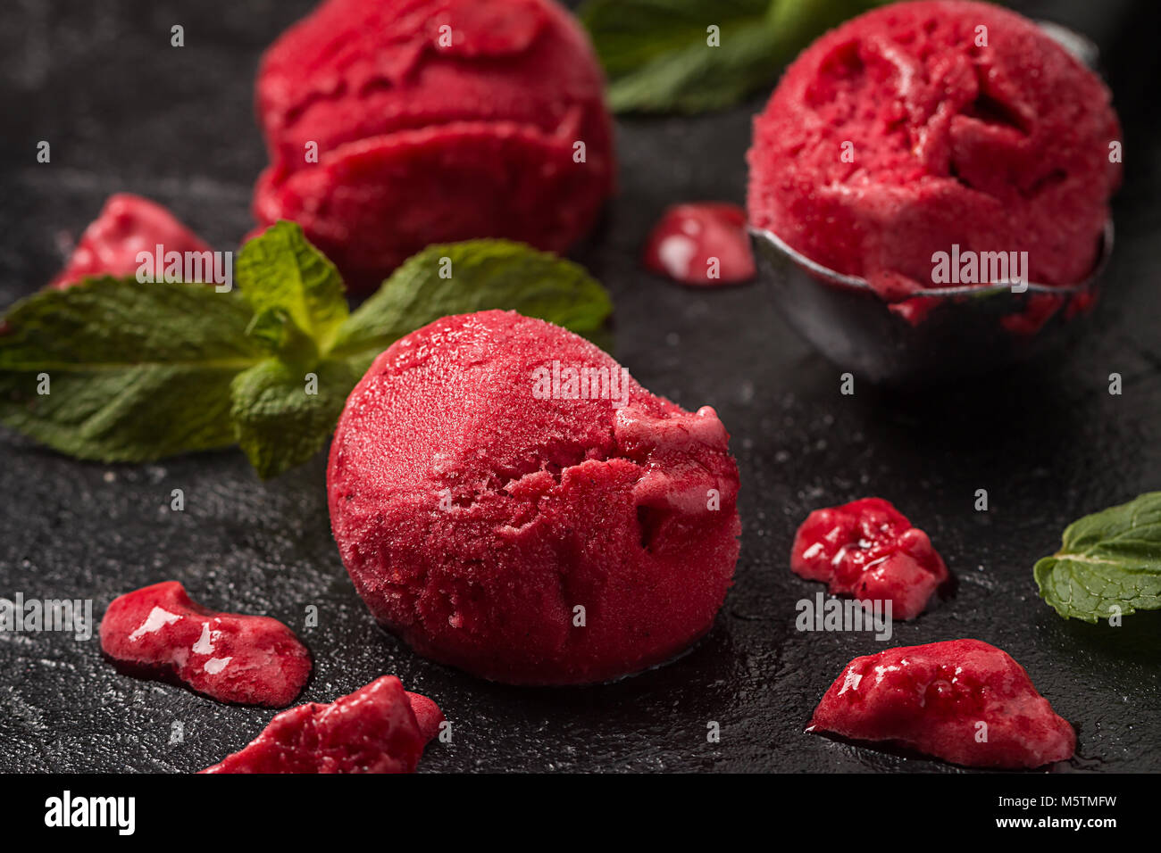 Raspberry red ice cream Stock Photo - Alamy