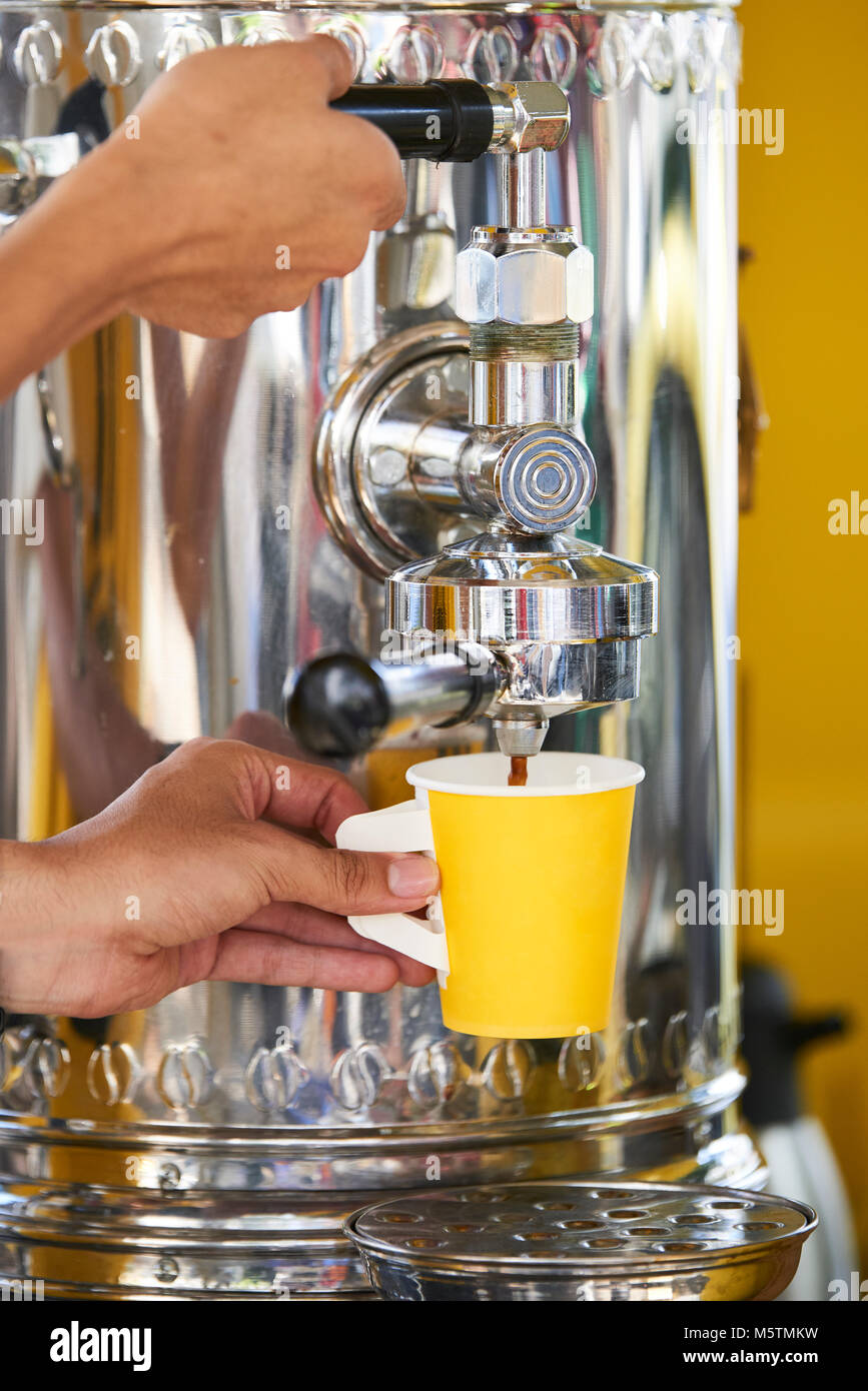 Close up Barista using Ancient Espresso Machine with Yellow Cup Stock ...