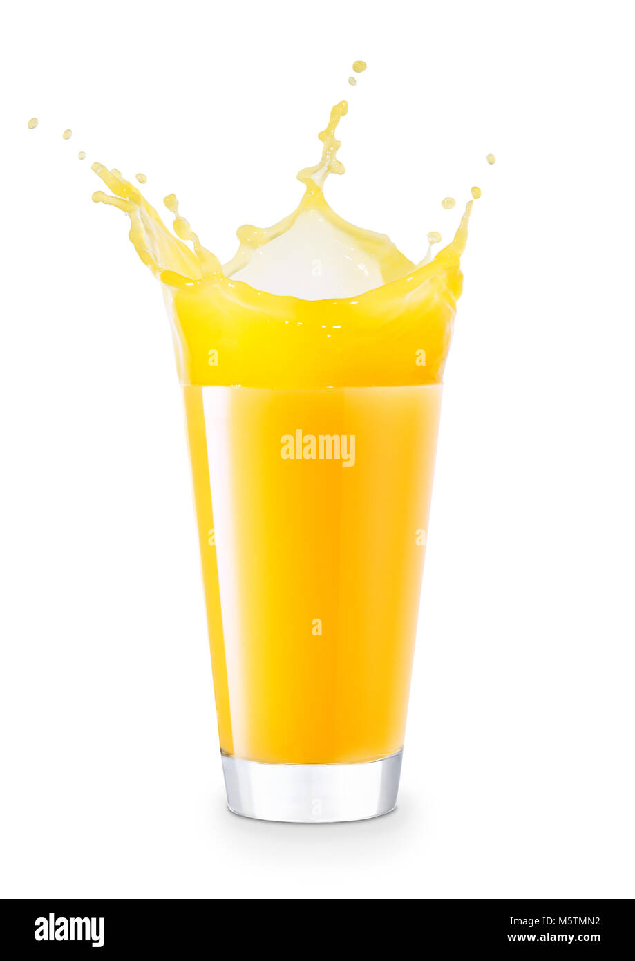 glass of splashing juice isolated on white background. Orange juice ...