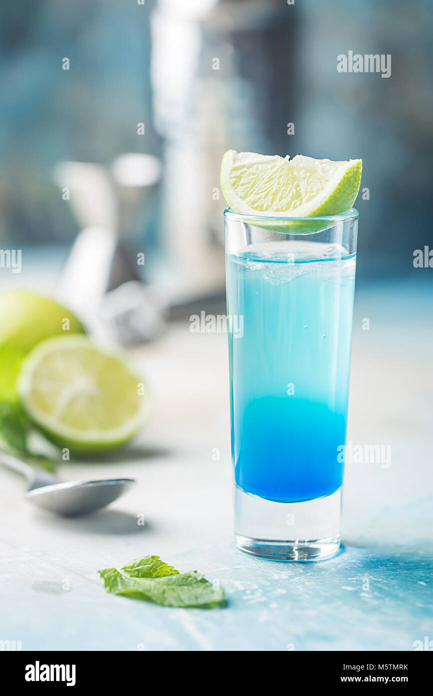 A blue layer alcoholic cocktail Stock Photo - Alamy