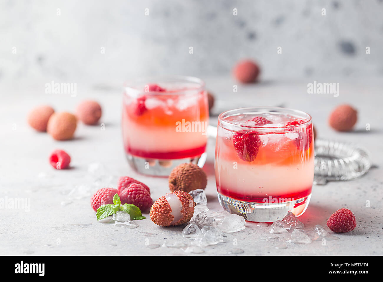 Cold lychee and raspberry cocktail Stock Photo - Alamy