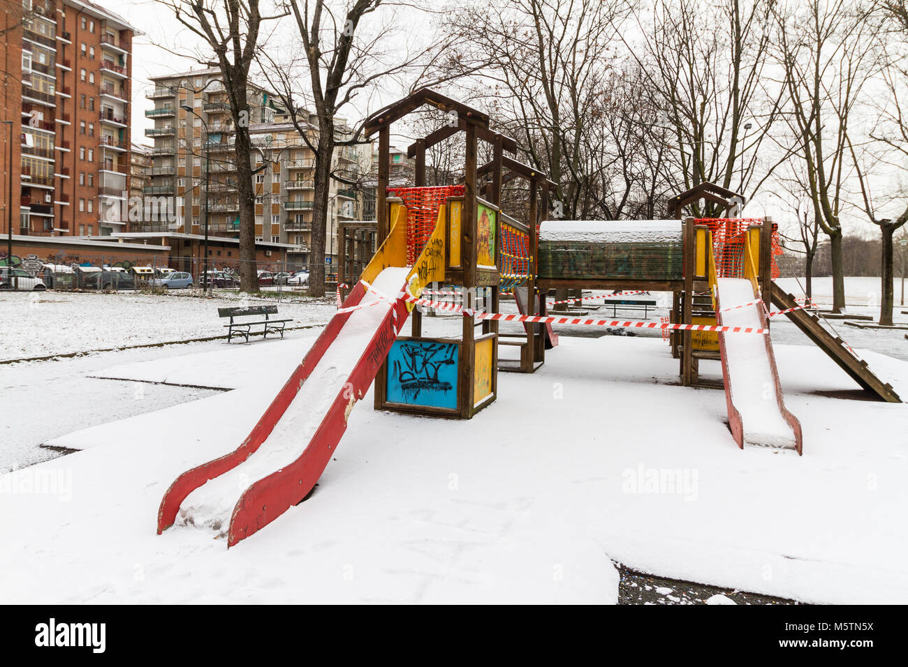Broken playground for children in Italy Stock Photo - Alamy