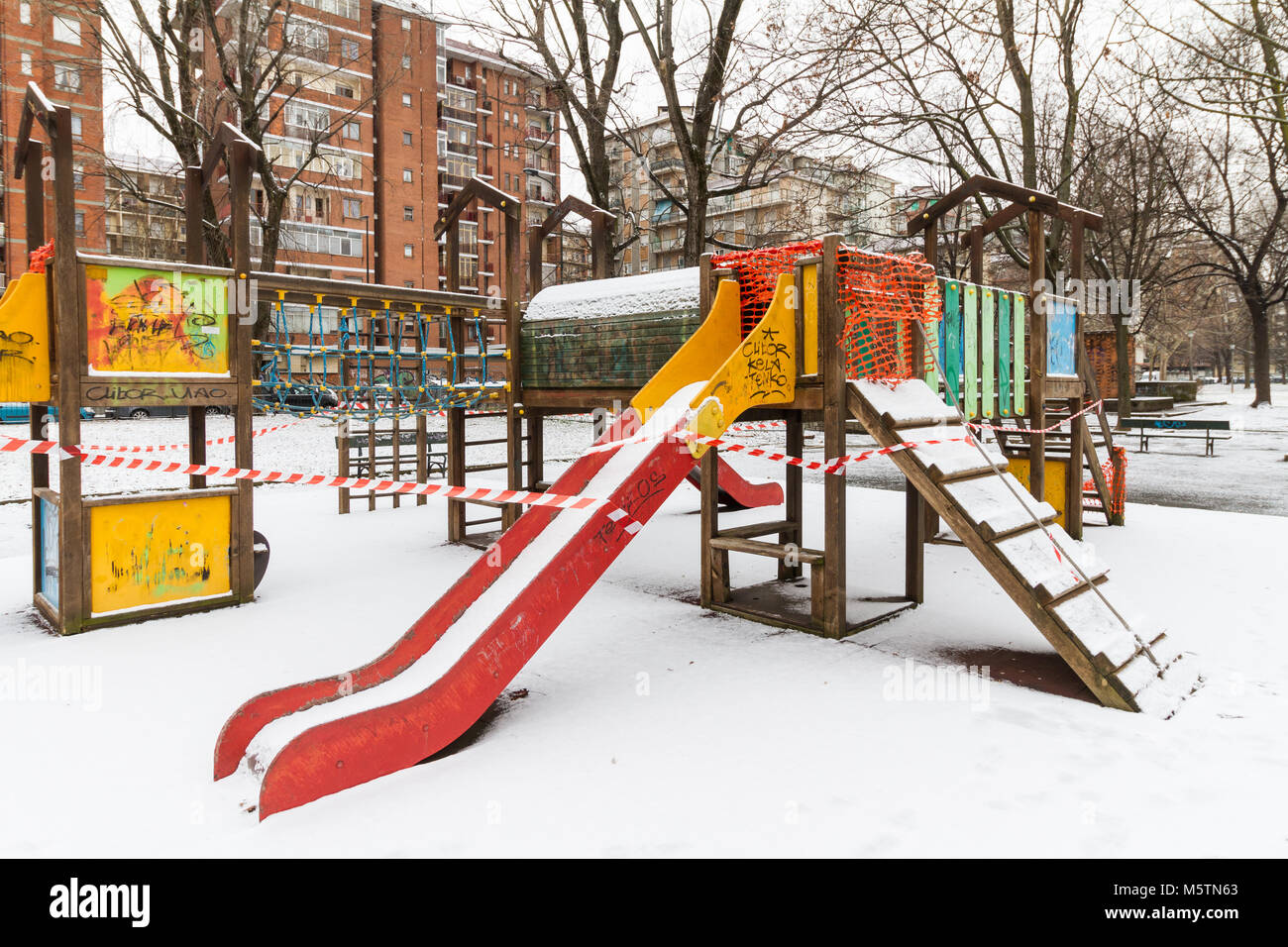 Broken playground for children in Italy Stock Photo - Alamy