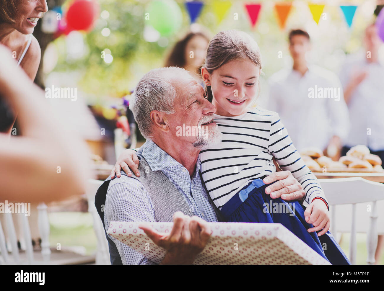 Family celebration or a garden party outside in the backyard Stock ...