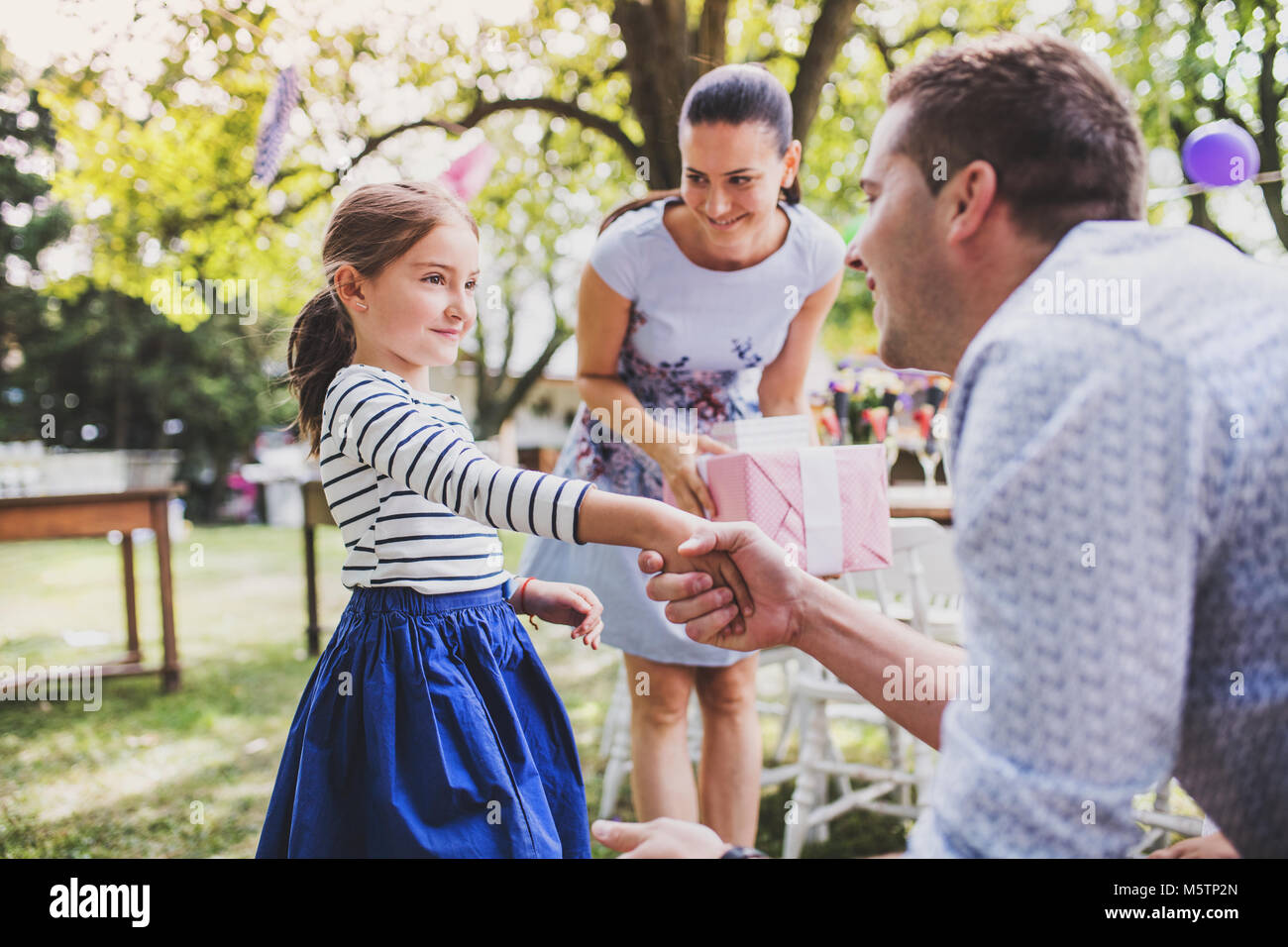 Family celebration or a garden party outside in the backyard Stock ...