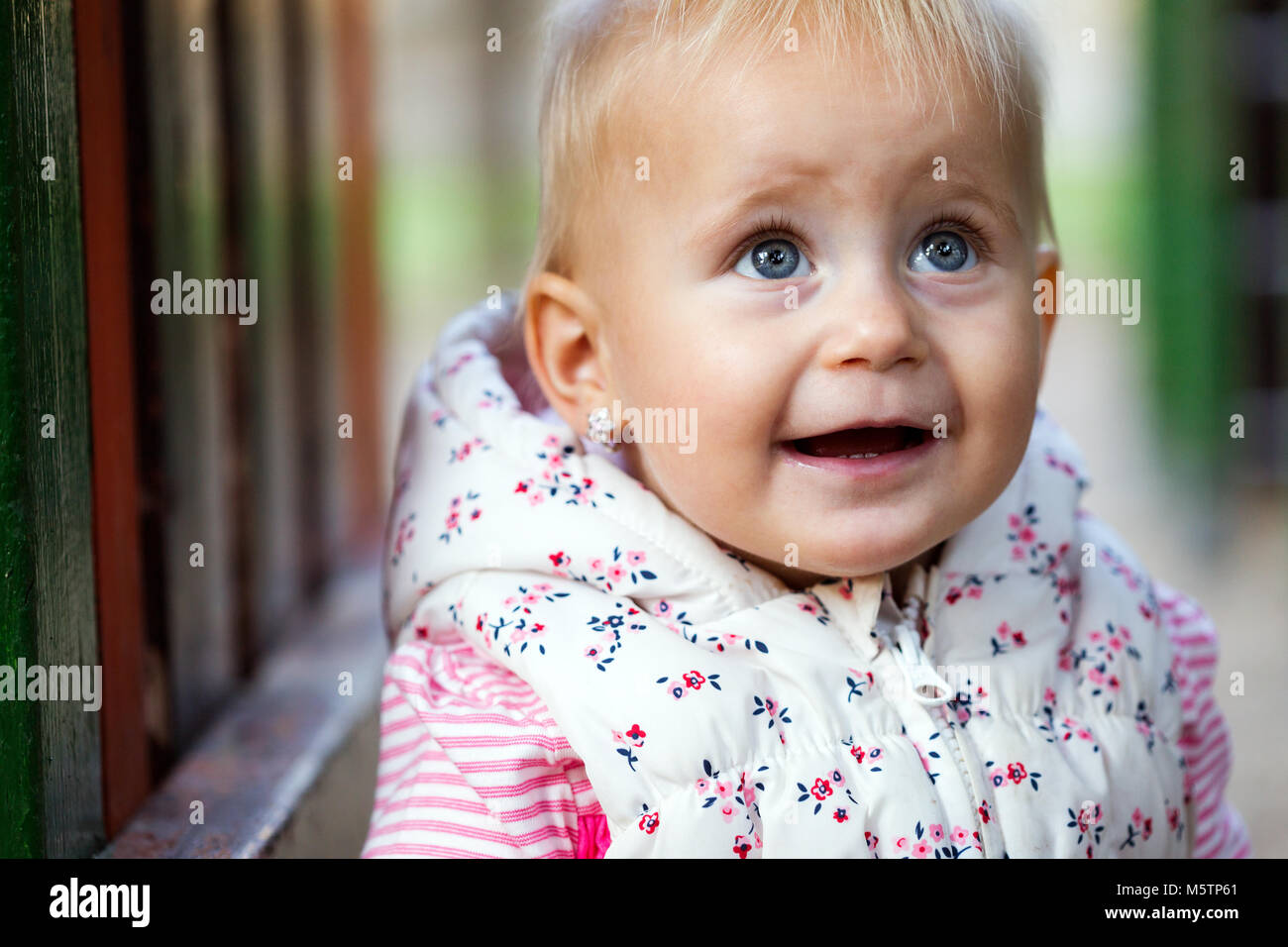 Sweet and happy baby girl Stock Photo - Alamy