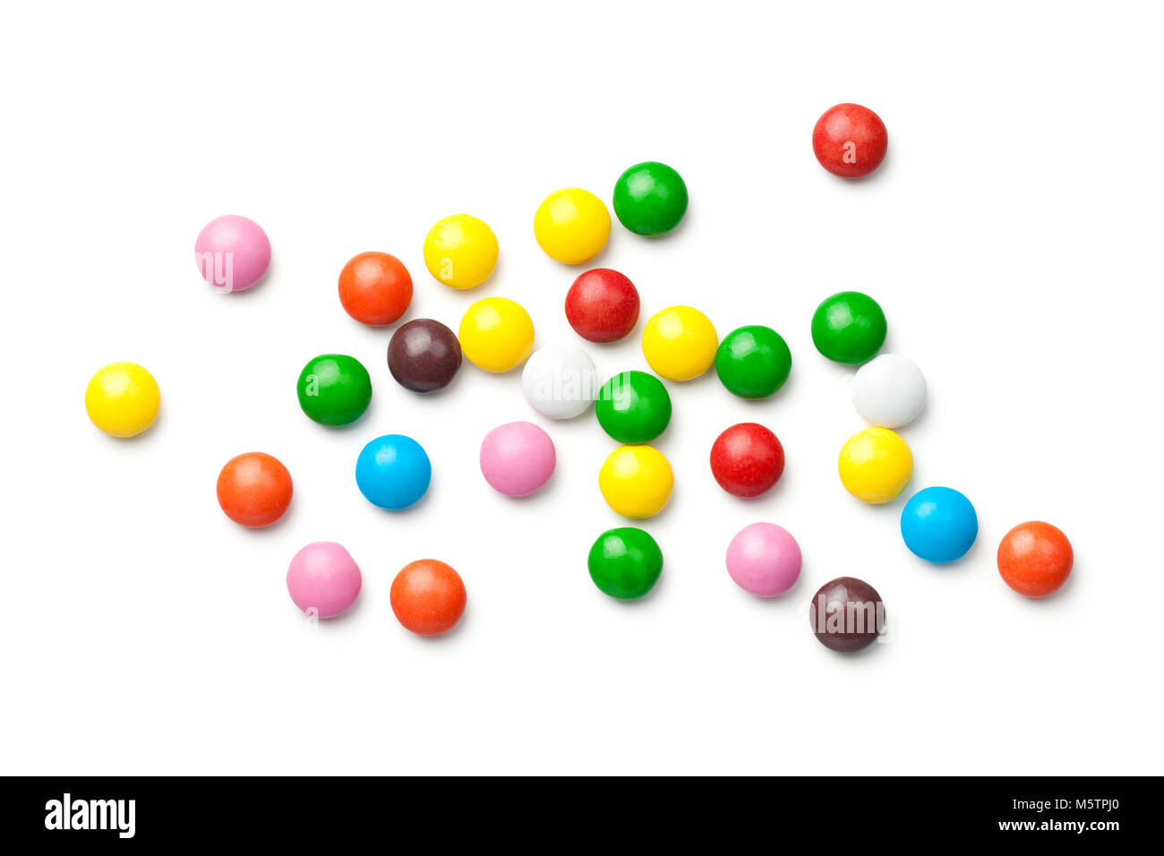 Colorful chocolate candy pills isolated on white background. Top view ...