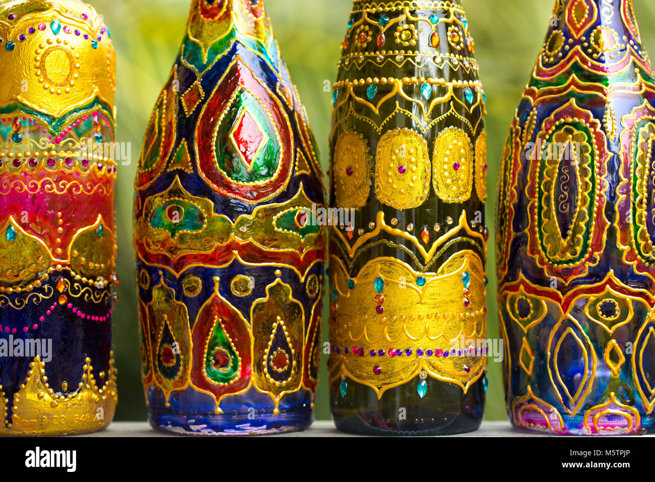 Background of bottles in a row Stock Photo - Alamy